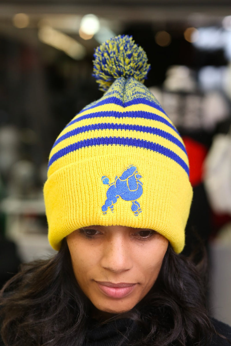 Frenchie Poodle pom-pom beanie, gold/blue – Burning Sands™