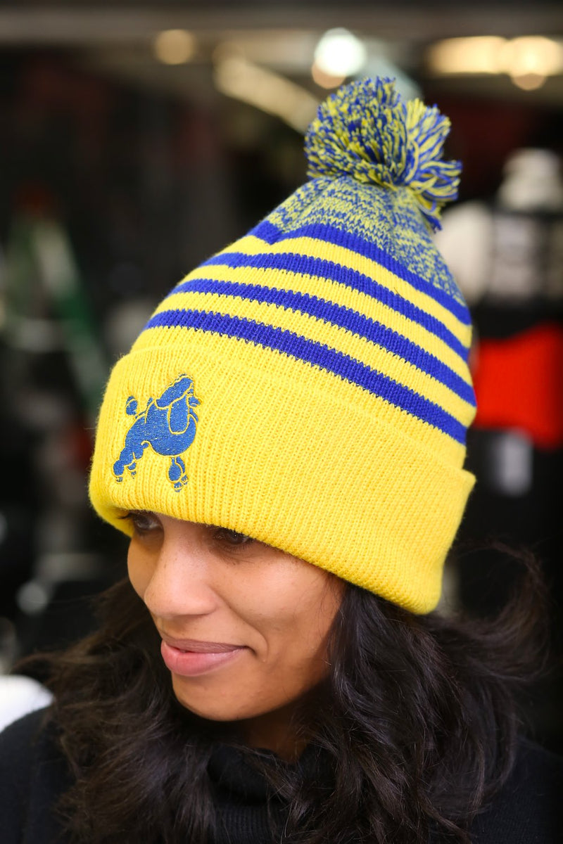 Frenchie Poodle pom-pom beanie, gold/blue – Burning Sands™